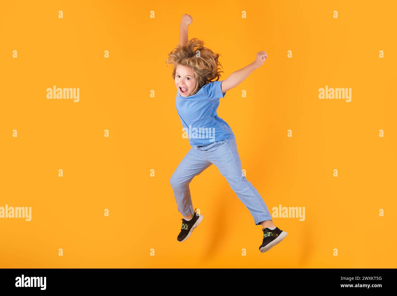Funny boy jumping. Full length body size of carefree child jump ...