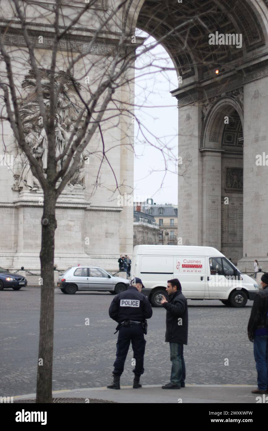 Police in paris at the Triumphal Arch in Paris Stock Photo - Alamy