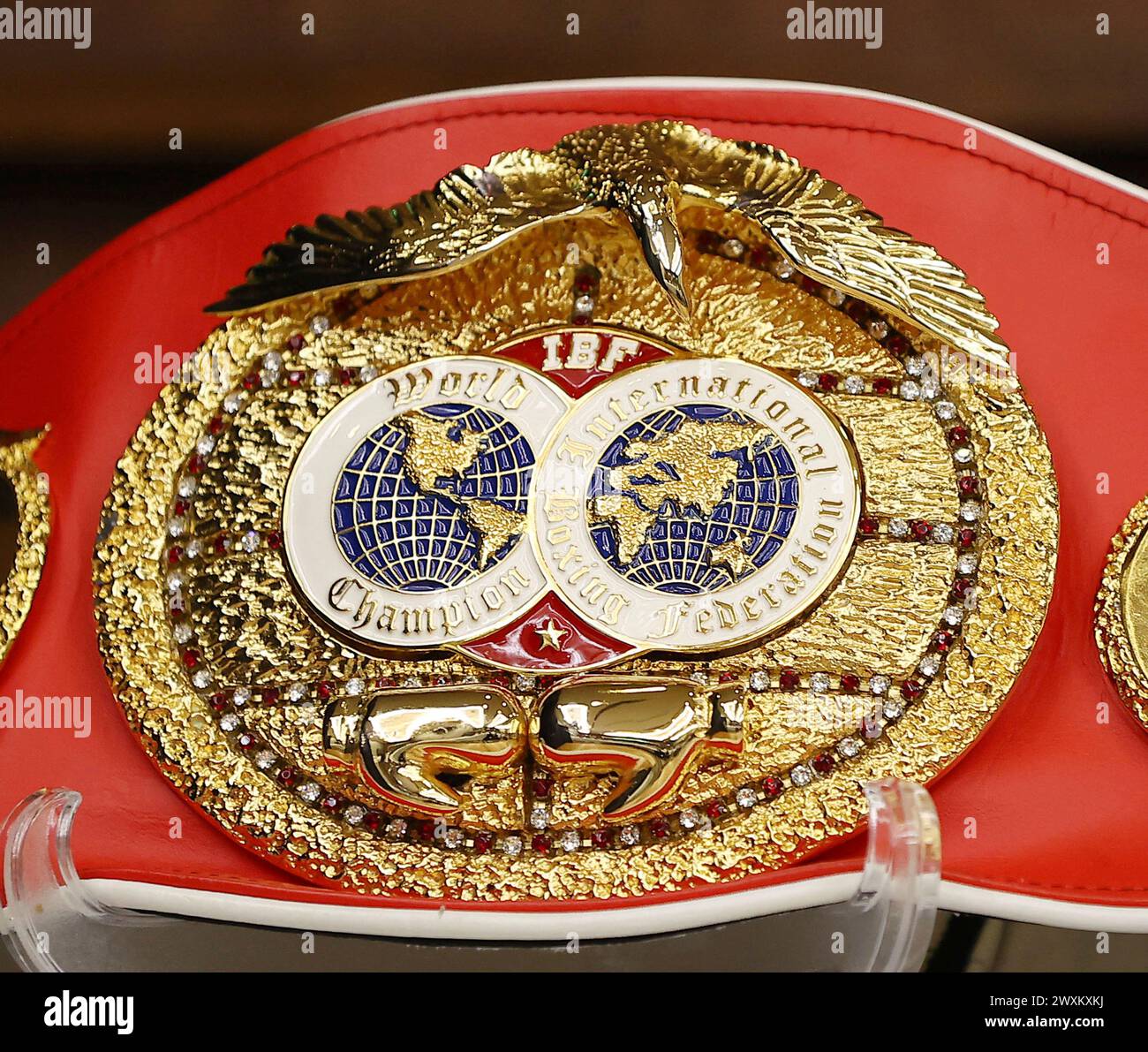A photo shows a championship belt of IBF (International Boxing ...