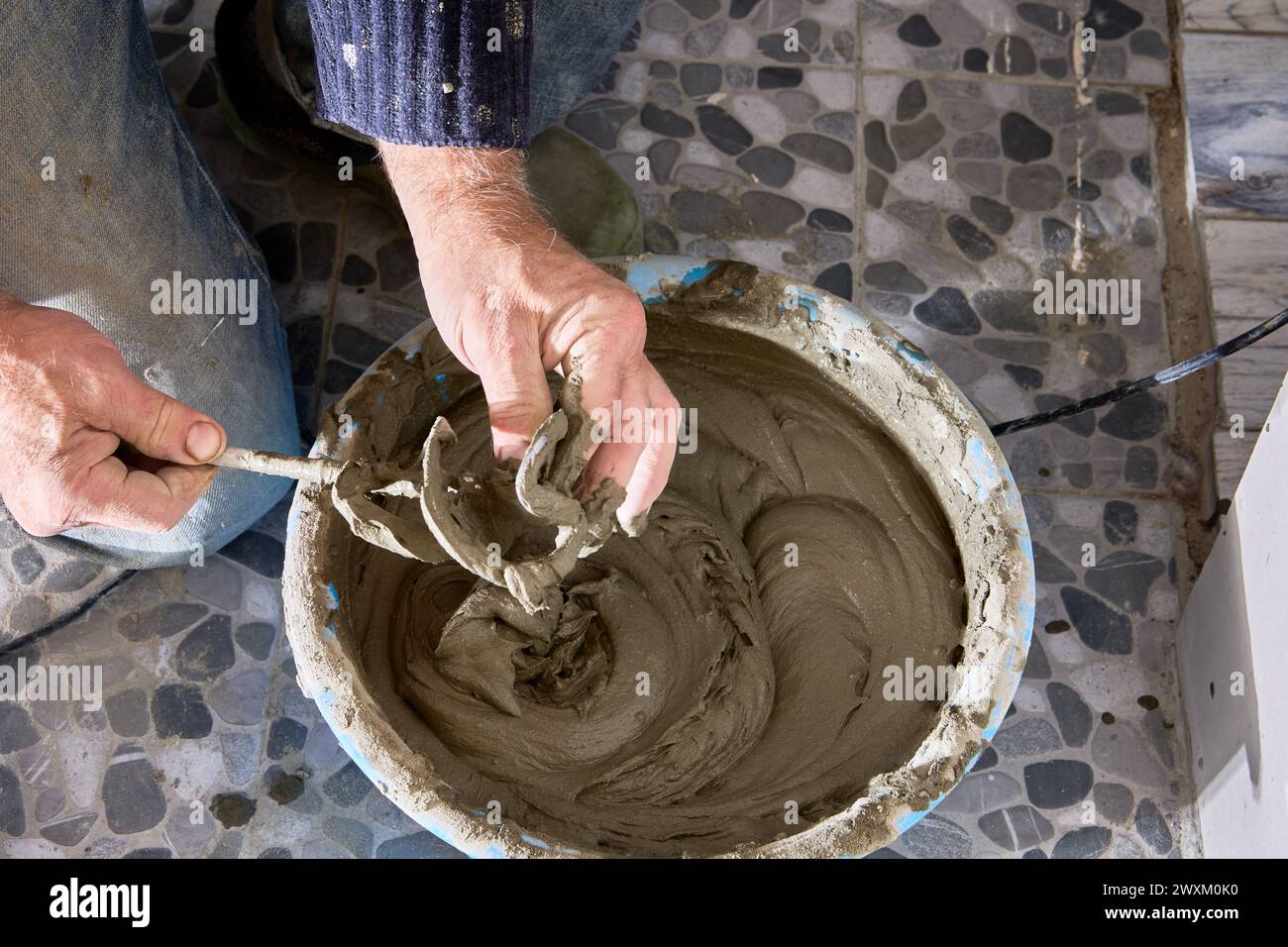 Paddle adhesive mixer attachment for power drill Stock Photo - Alamy