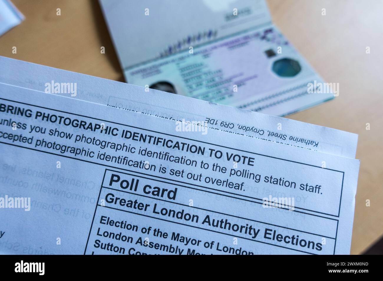 Passport Photo ID with UK polling card Stock Photo - Alamy