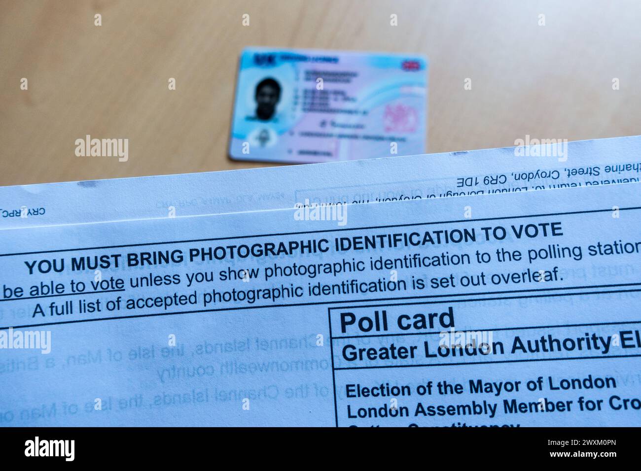 UK electoral poll card with photo ID driving license as document Stock ...