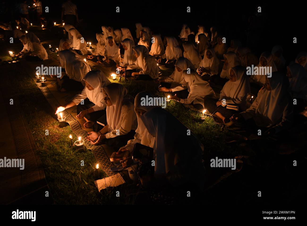 March 31, 2024, Boyolali, Central Java, Indonesia: Students pray and ...