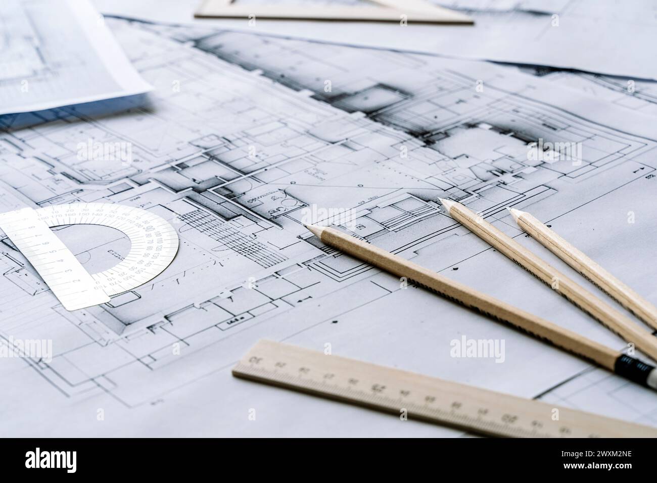 Architectural engineering design plan drawing on the table. Architect's ...