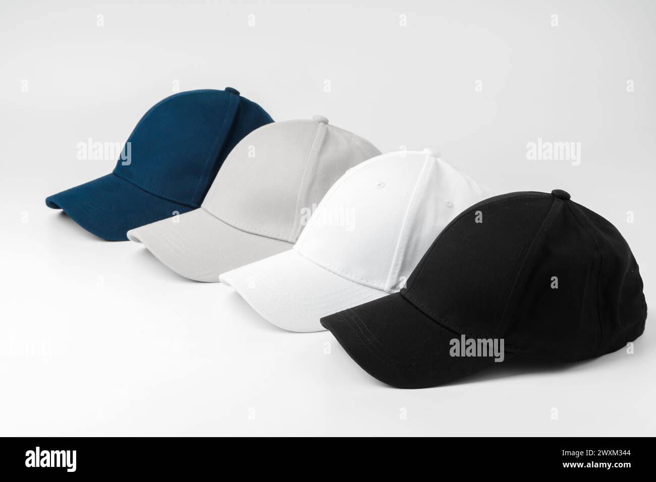 Curved caps hi-res stock photography and images - Alamy