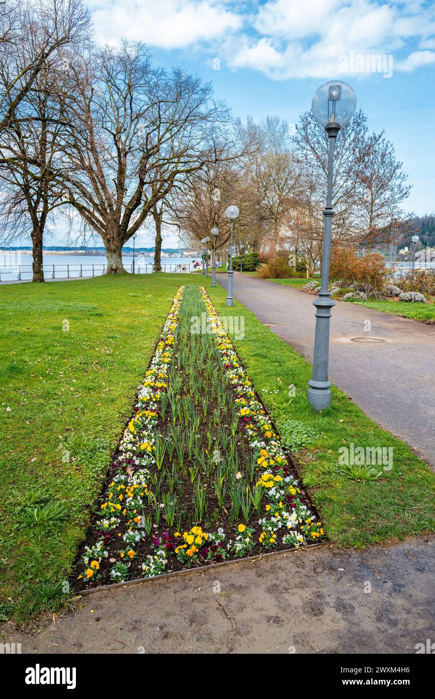 Bregenz, Austria - March 15, 2024: Park and promenade by Lake Constance ...