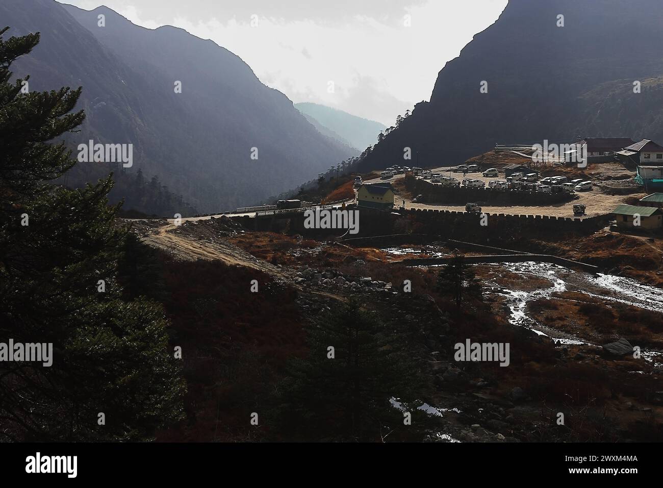 beautiful stream flowing through the scenic mountain valley, surrounded ...
