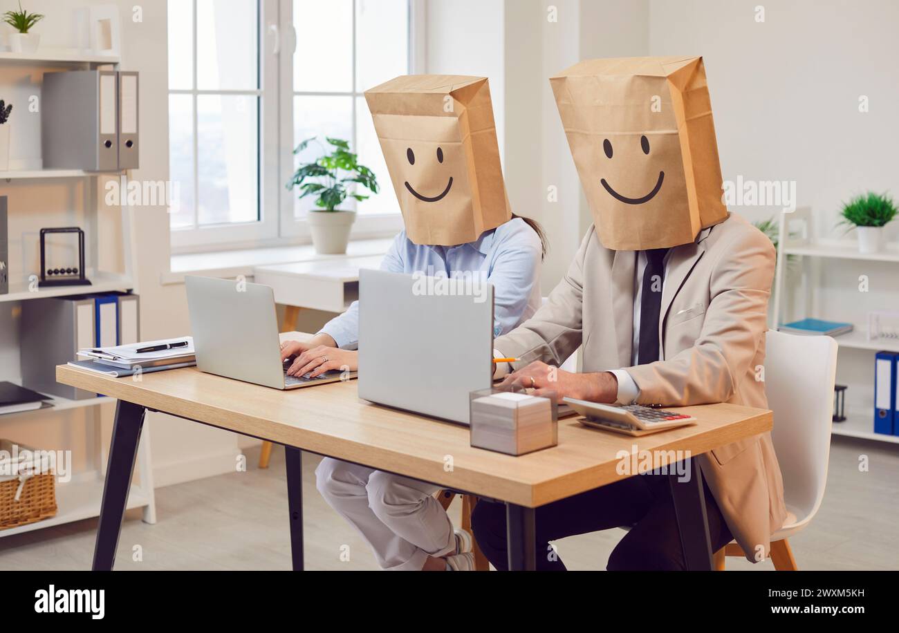 Two funny faces worker woman hi-res stock photography and images - Alamy