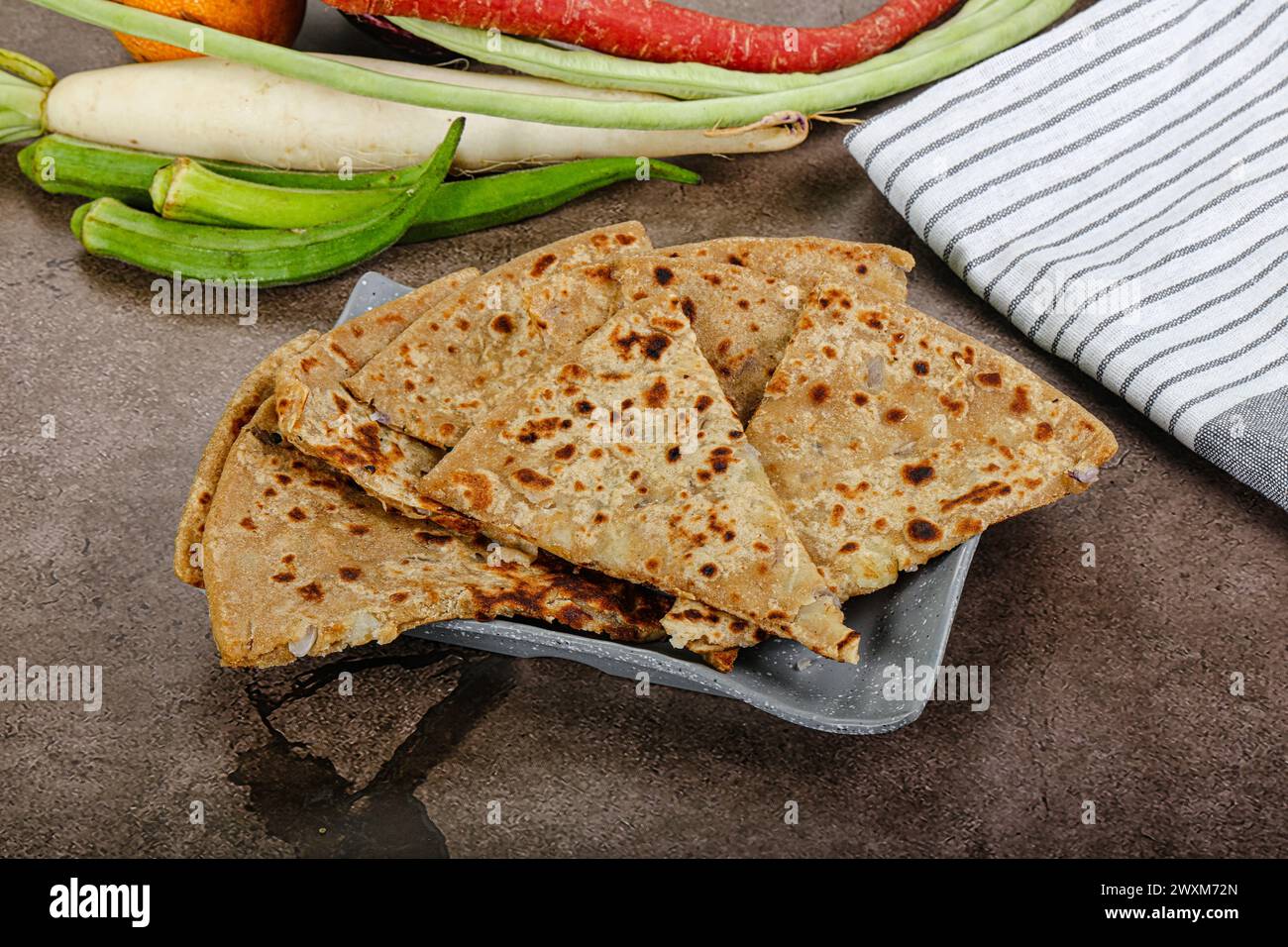 Indian vegetarian Aloo Paratha - bread with potato Stock Photo - Alamy