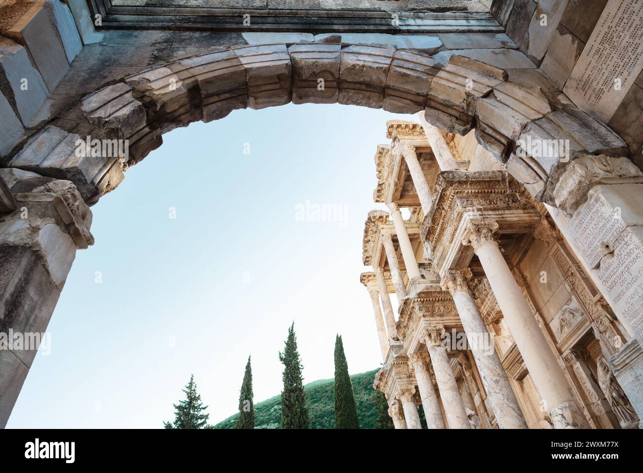 Entrance through the arch of the Library of Celsus in the ancient city ...