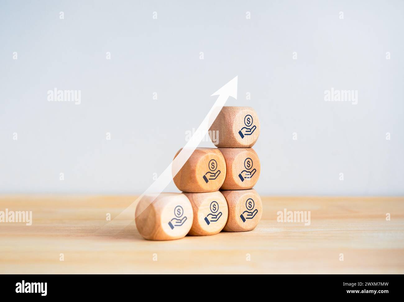 Save money icon on wooden blocks bar graph chart steps with rising ...