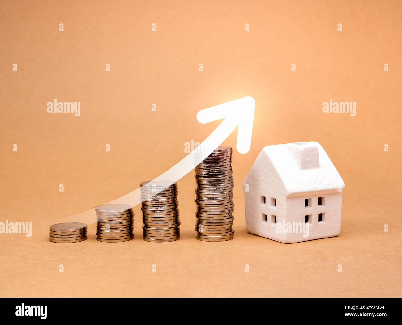 Upward arrow on money coin stack as growth graph steps near white house ...