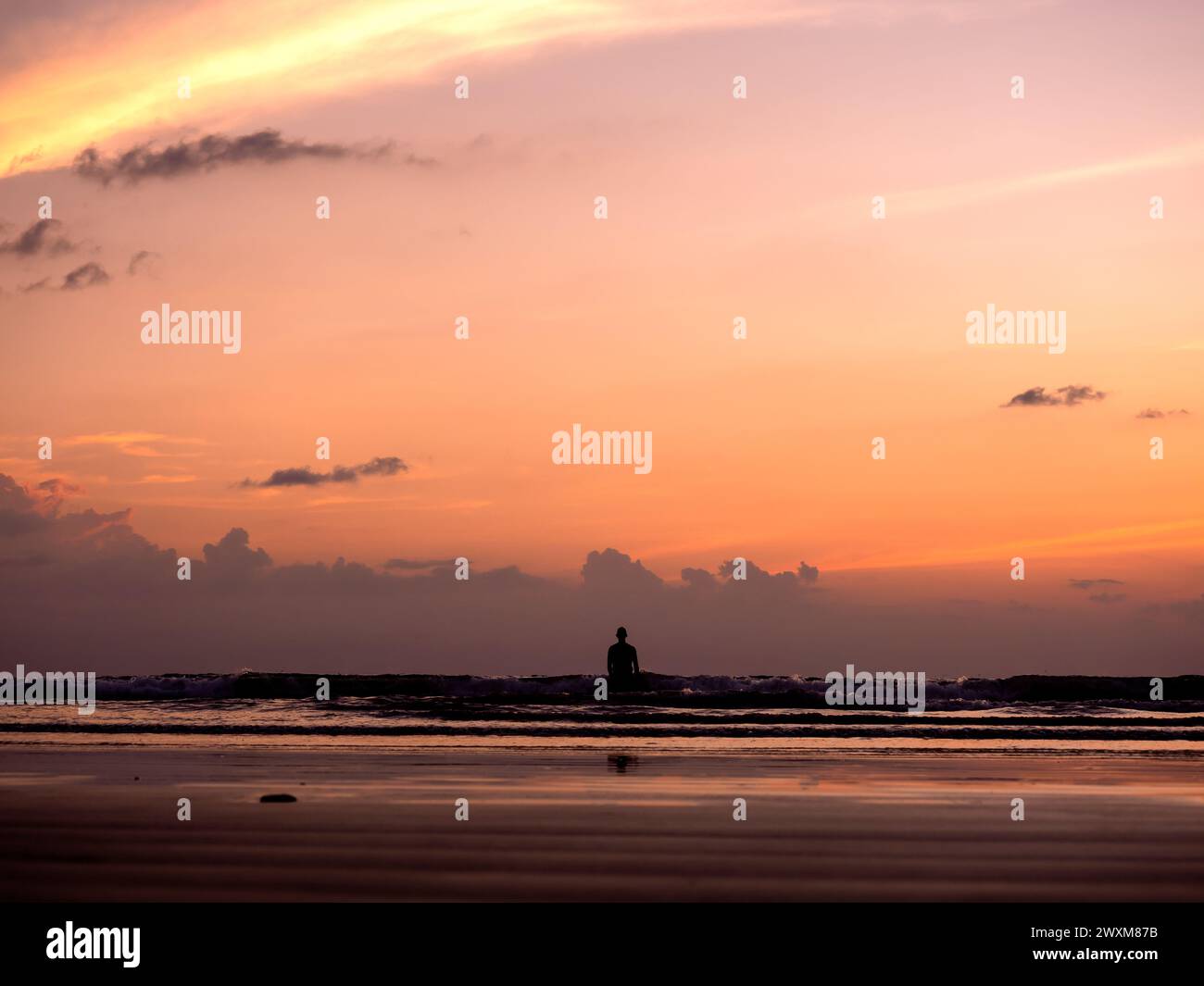Man standing in sea shadow hi-res stock photography and images - Alamy