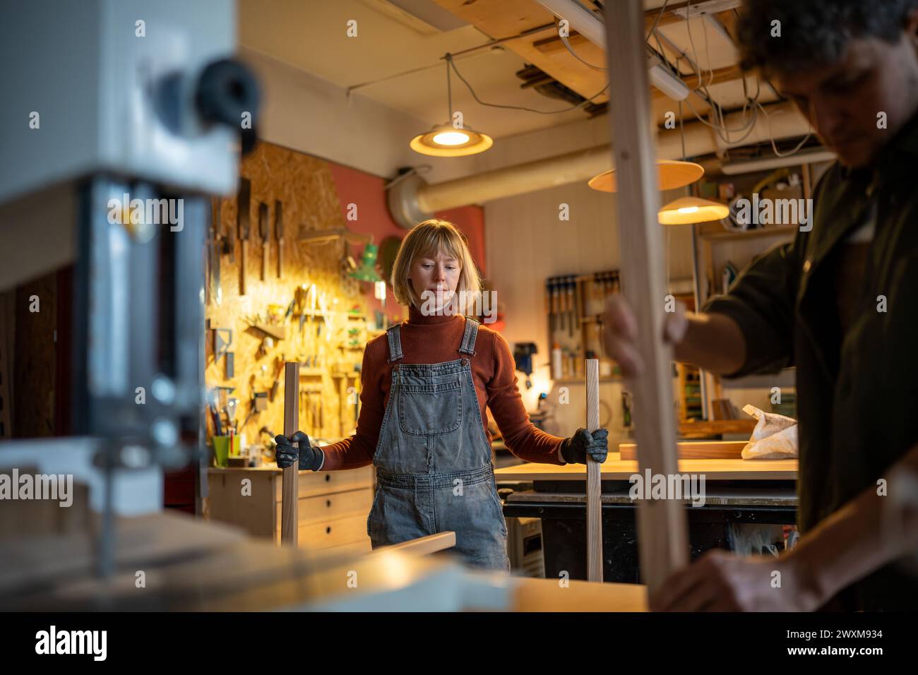 Carpentry workshop, carpenters working together. Manufacture of ...