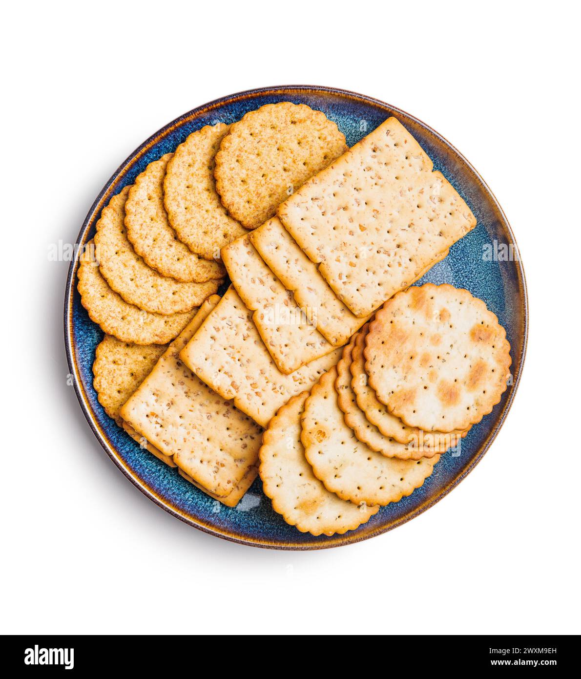 Salted crackers isolated on plate on a white background Stock Photo - Alamy