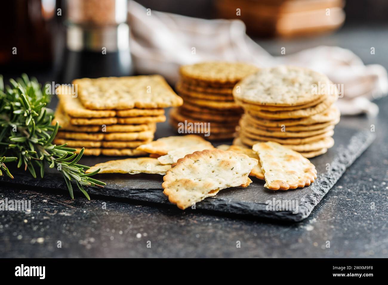A stack of crackers neatly arranged on a kitchen counter Stock Photo ...