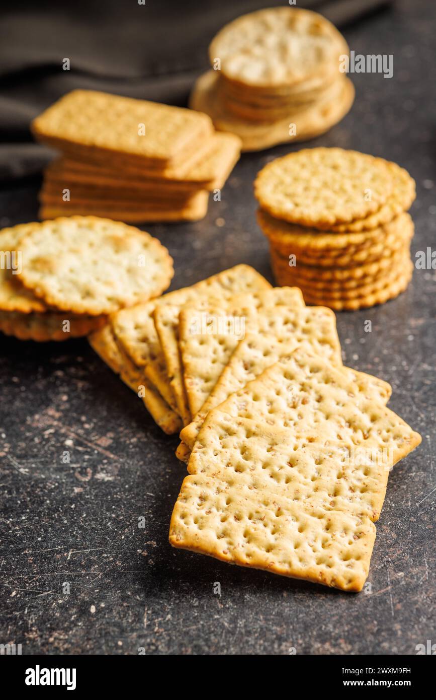 A stack of crackers neatly arranged on a kitchen counter Stock Photo ...
