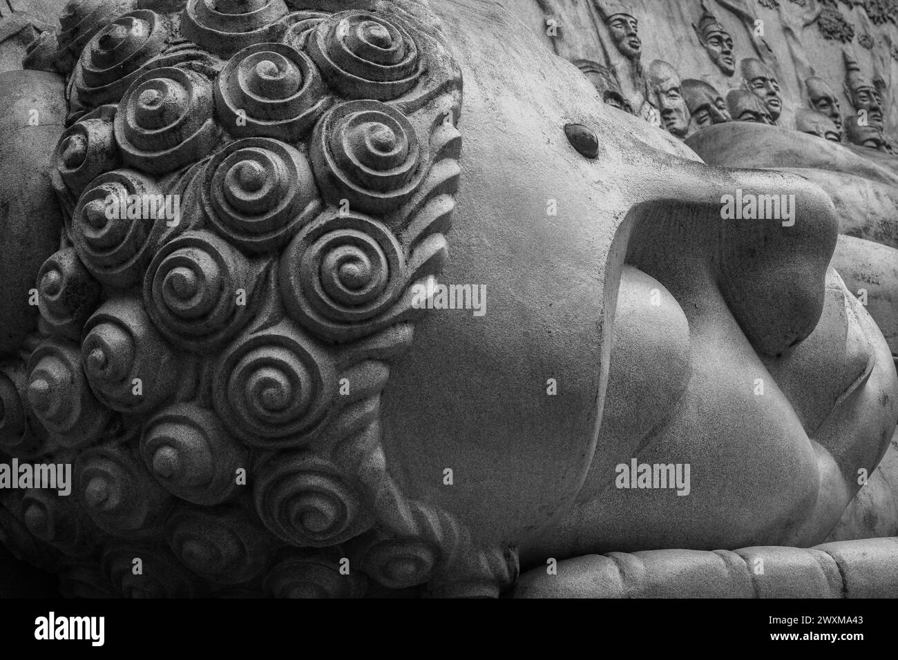 Sleeping buddha statue close up Black and White Stock Photos & Images ...