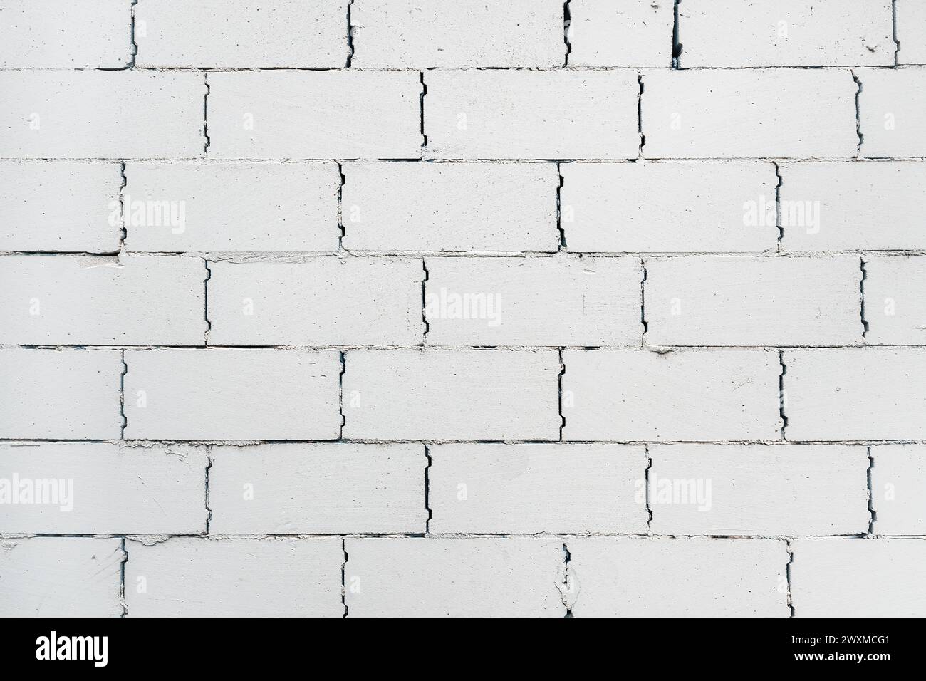 Building wall made of white concrete blocks, architecture and ...