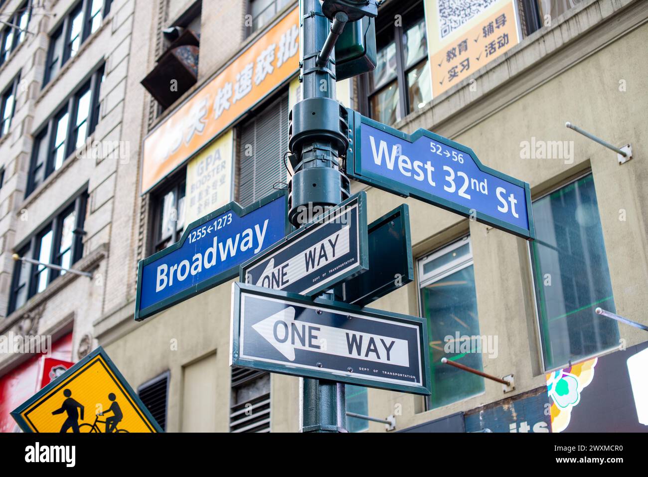 Intersection signage near building hi-res stock photography and images ...