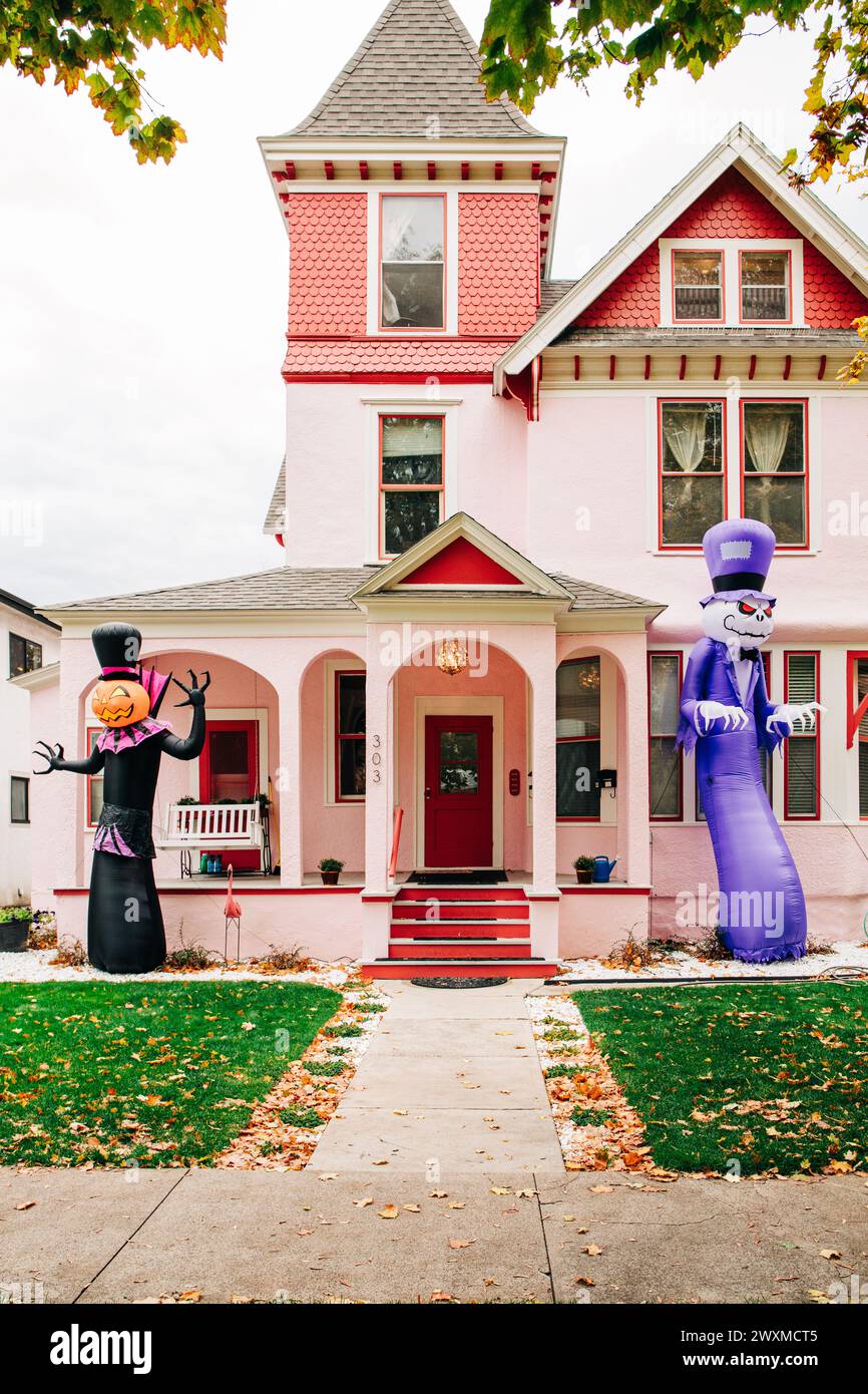 Halloween inflatables in front yard of pink mansion house Stock Photo ...