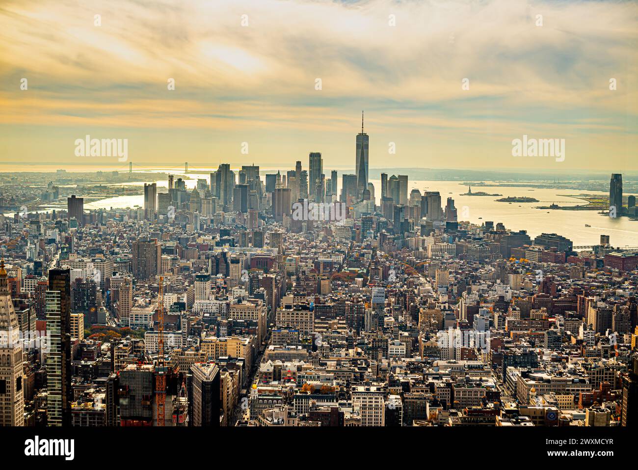 A sprawling urban landscape filled with towering skyscrapers and large ...