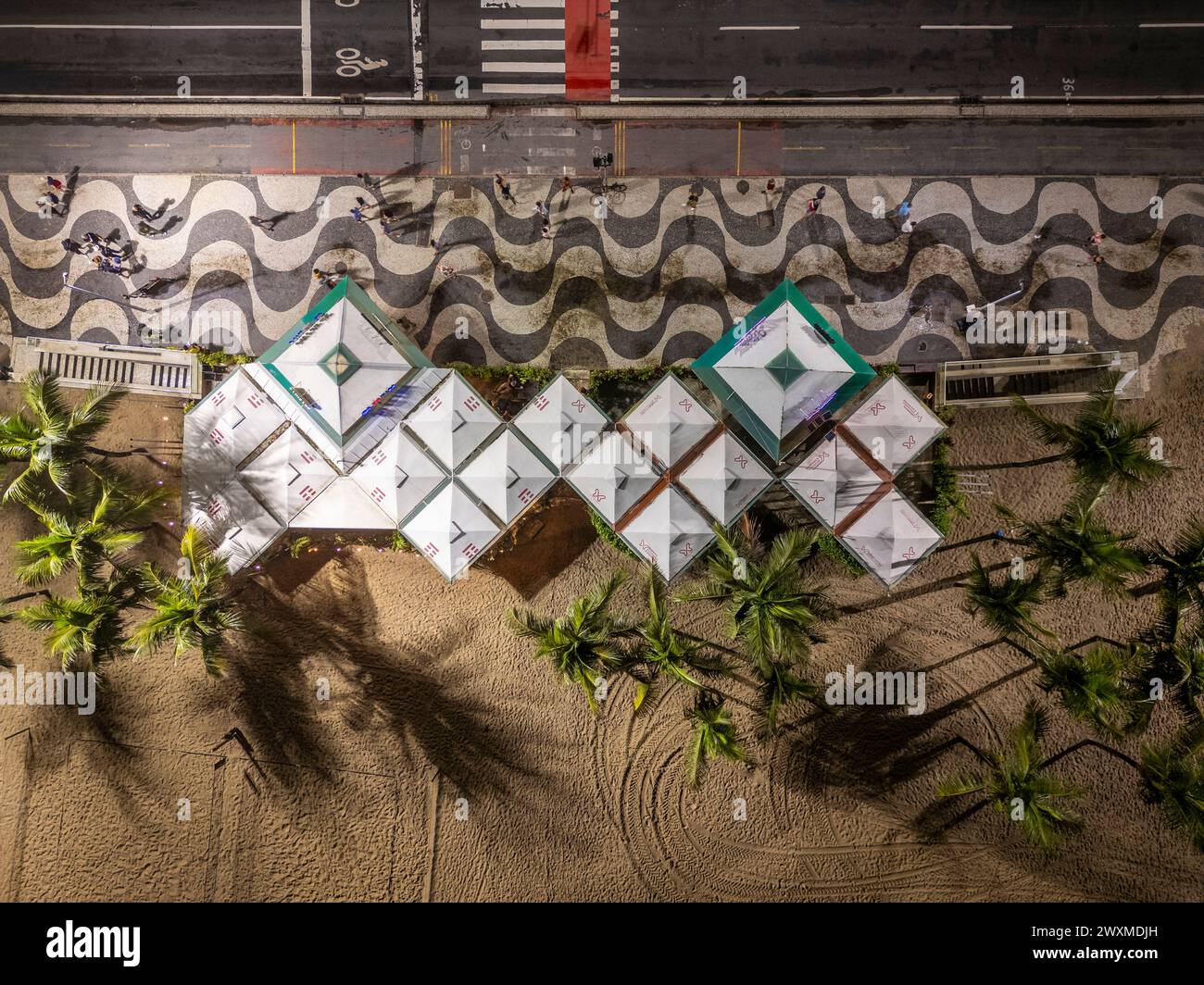Beautiful top down aerial view to Copacabana Beach sidewalk and kiosks ...