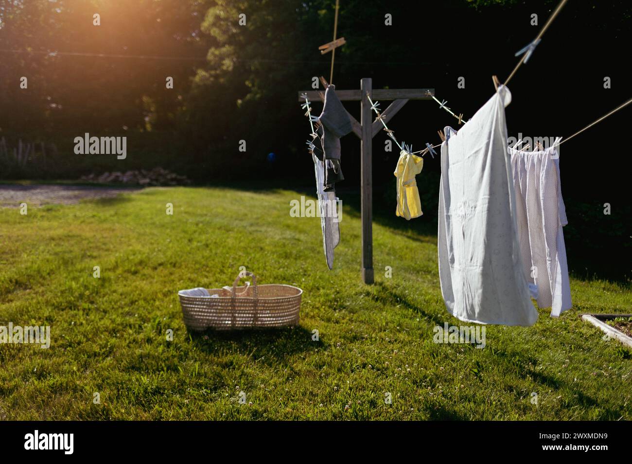 Baby clothes on washing line hi-res stock photography and images - Alamy