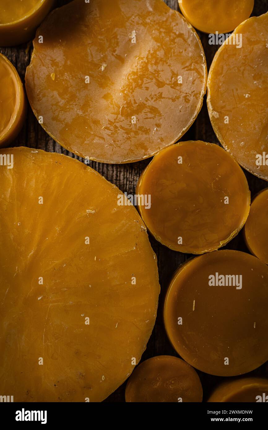 Circular blocks of beeswax vertical layout. Pure yellow candle wax ...