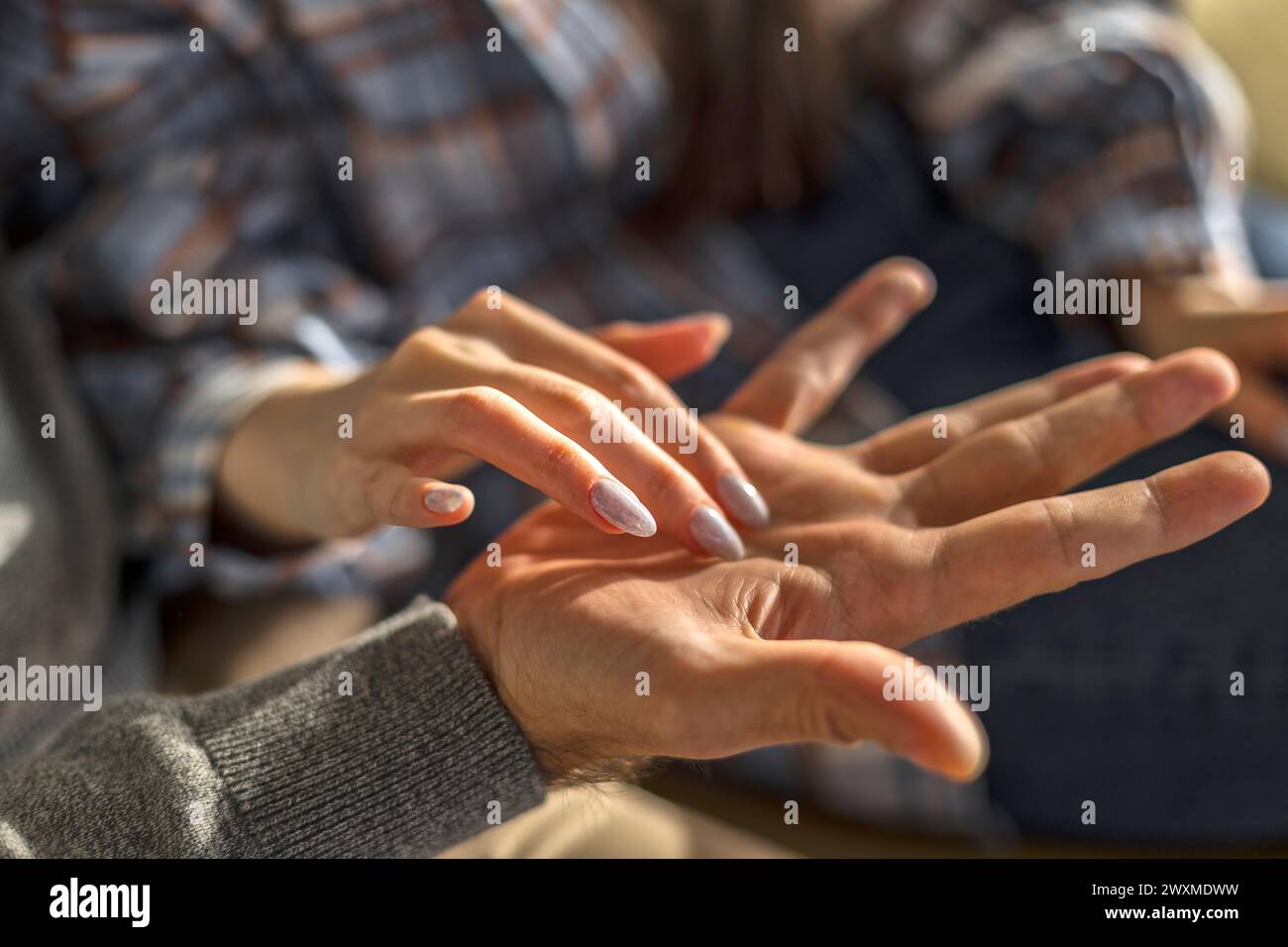 Two touching hands hi-res stock photography and images - Alamy