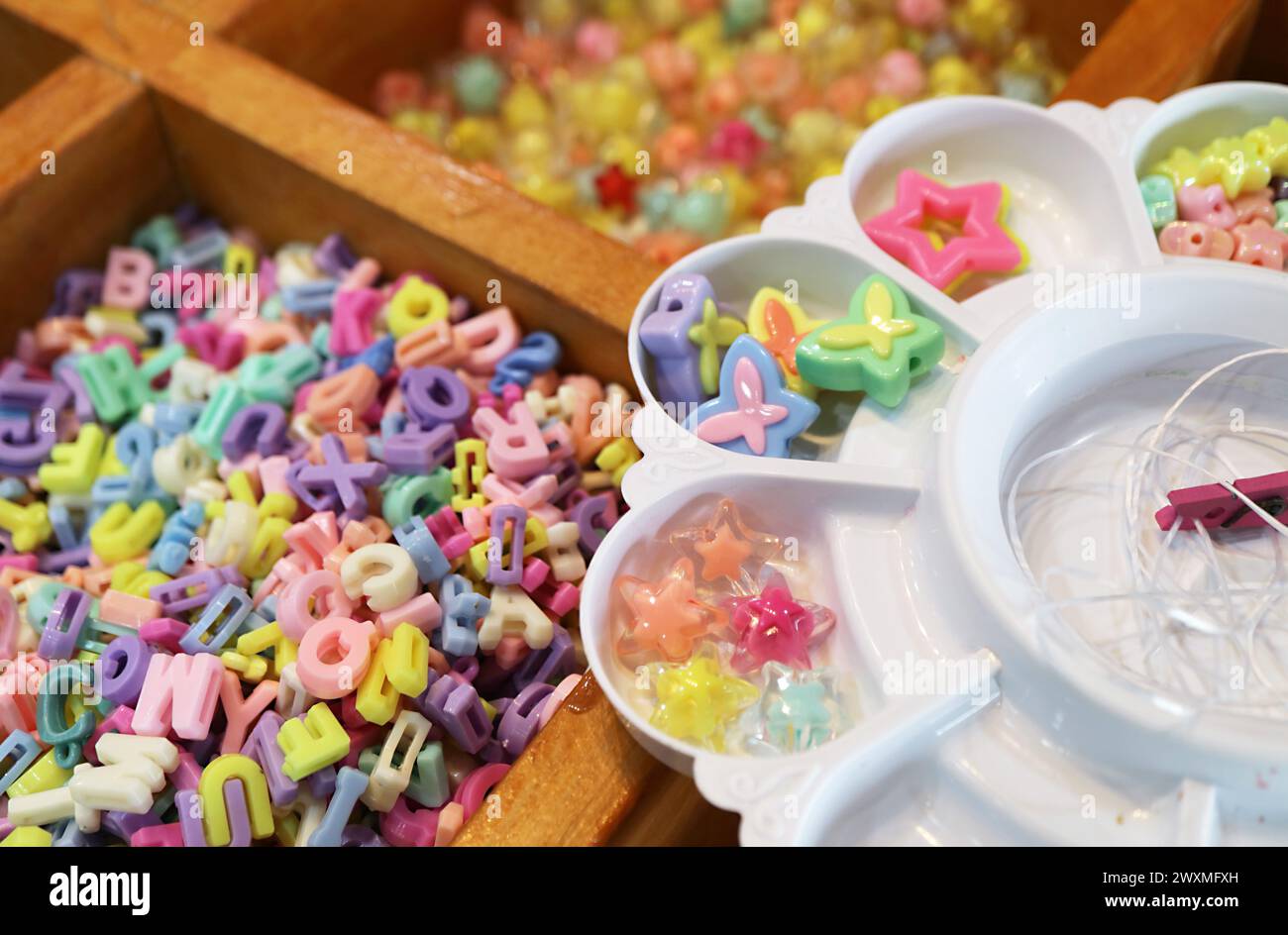 Choosing Various Types of Beads for DIY Beading Workshop Stock Photo ...