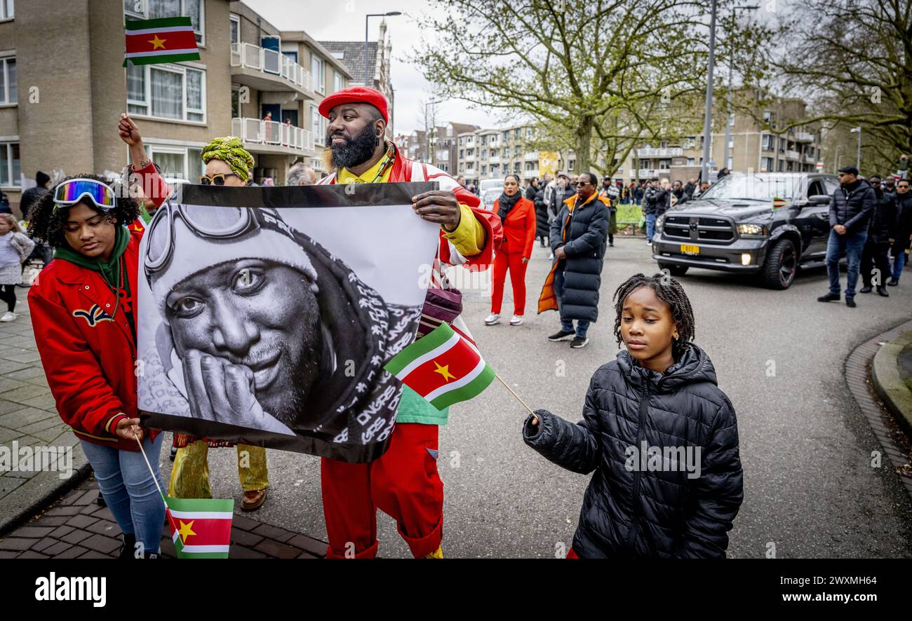 ROTTERDAM - The body of rapper Def Rhymz is driven around during a ...