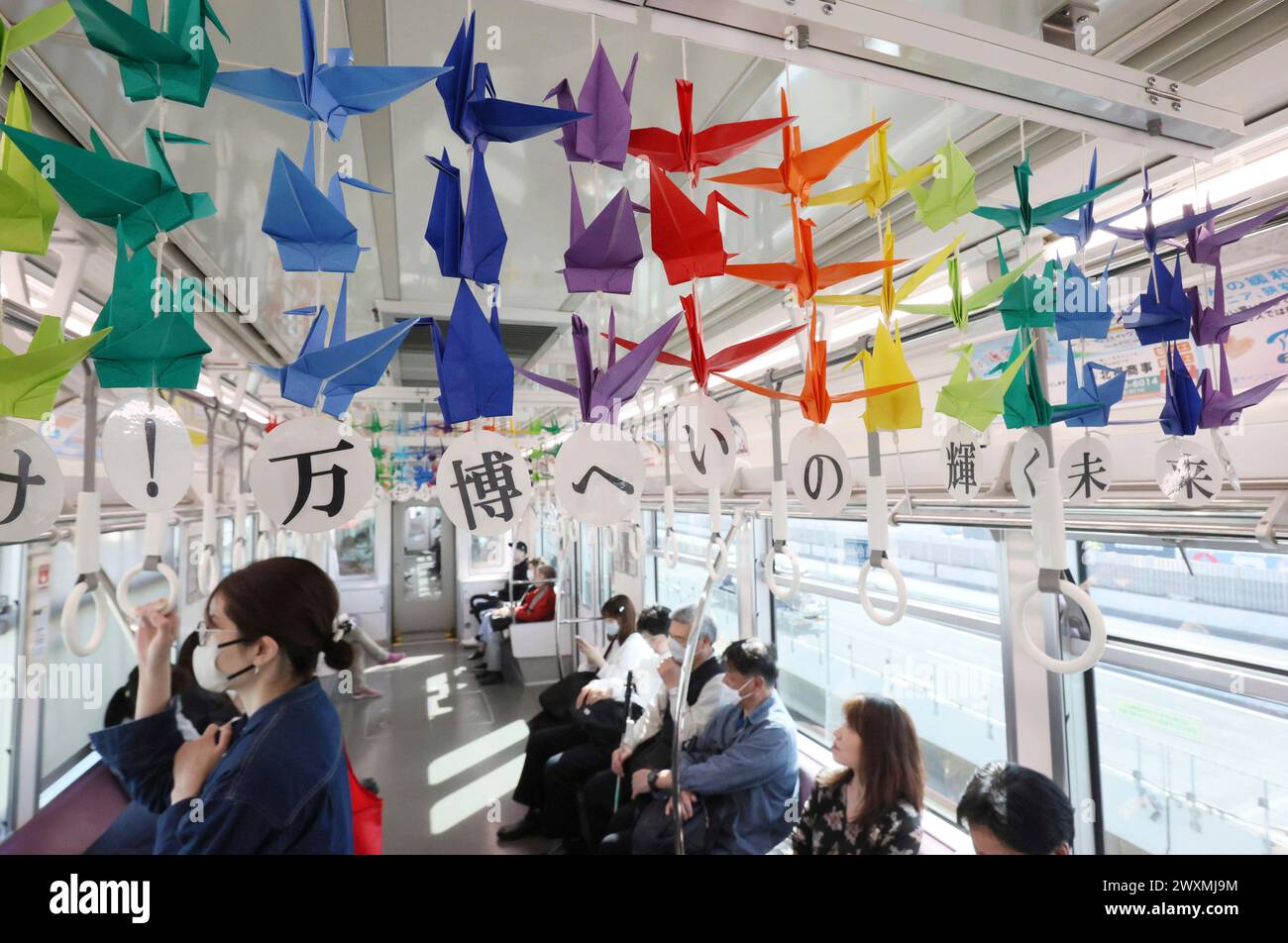 "Life Shining Origami Crane Train" is decorated with colorful origami ...