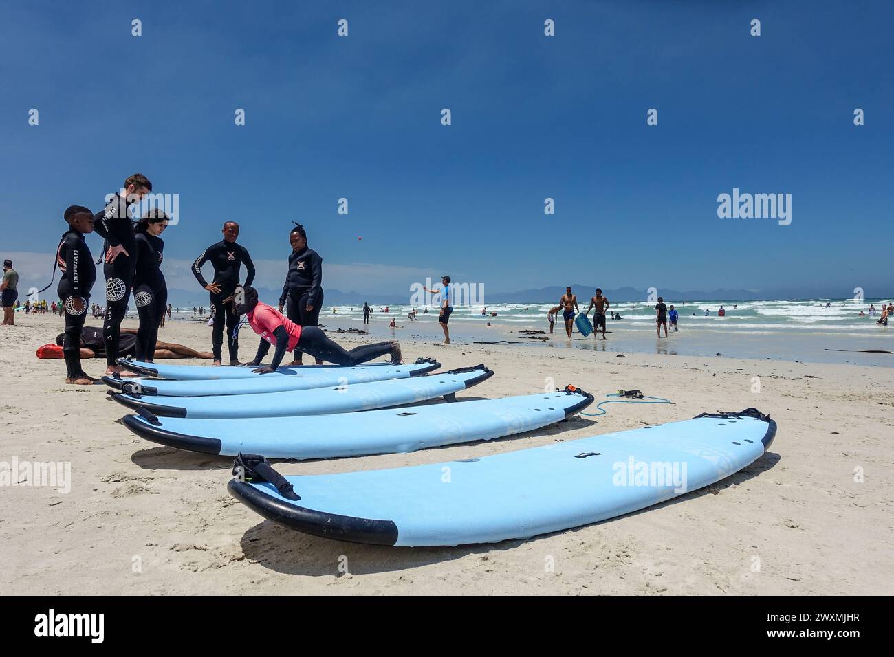 Wetsuit surf boards hi-res stock photography and images - Alamy