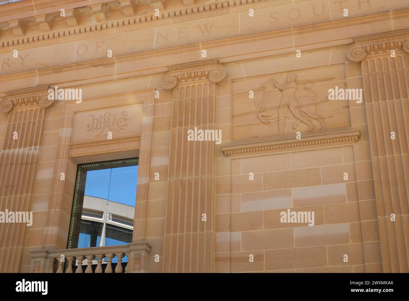 Caxton window, Bas-relief sandstone carvings Caxtons printers mark ...