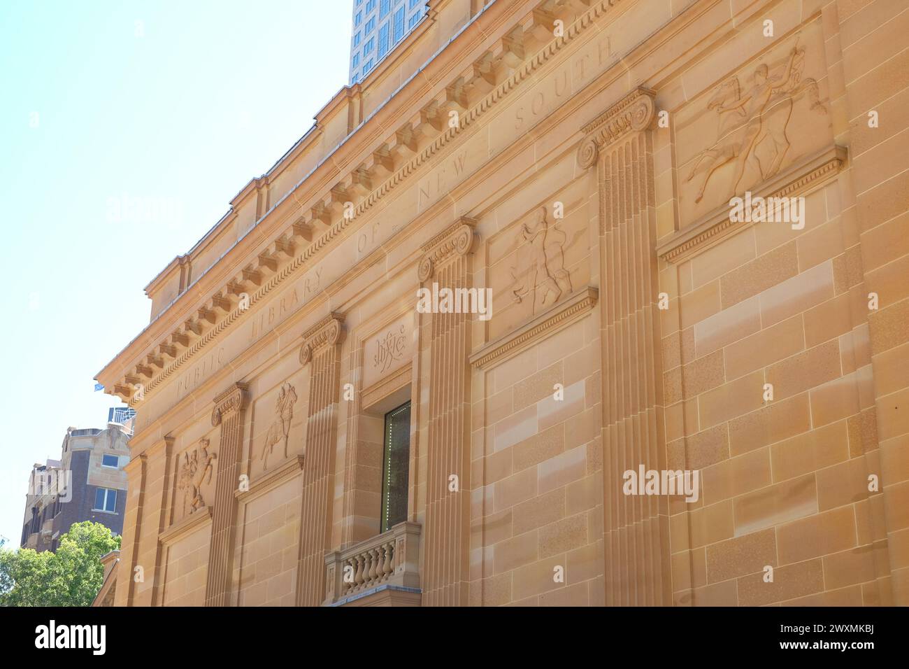 Four bas-relief sandstone carvings on the Mitchell Library south facade ...