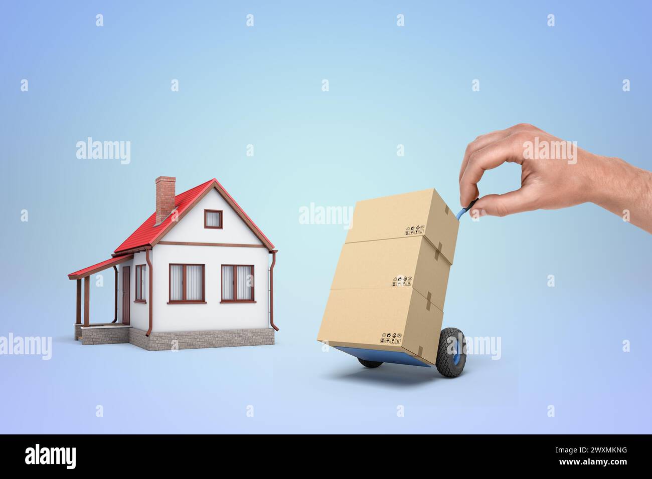 Hand pulling box on wheels towards house Stock Photo - Alamy