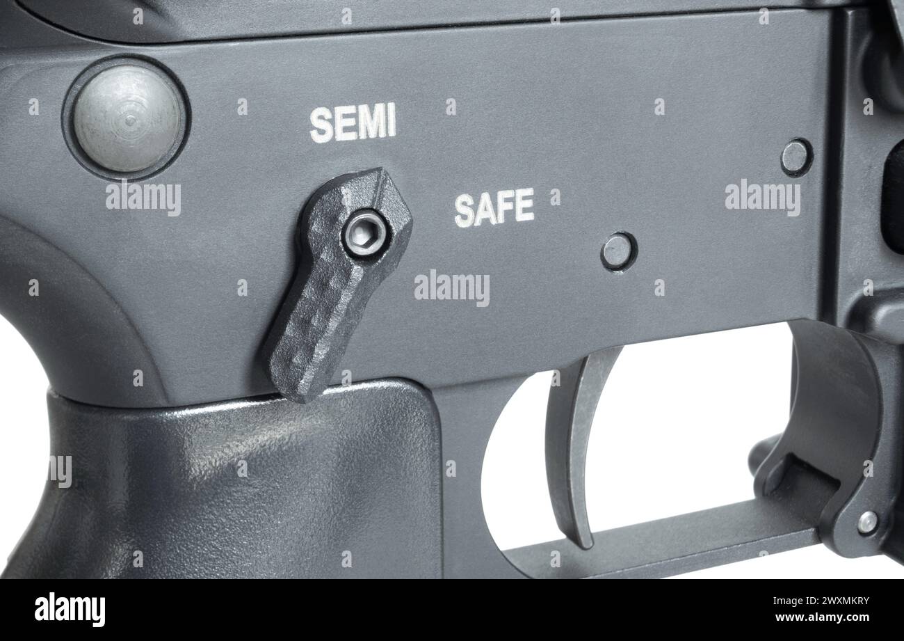 Ambidextrous safety selector on an assault rifle switched to the ...