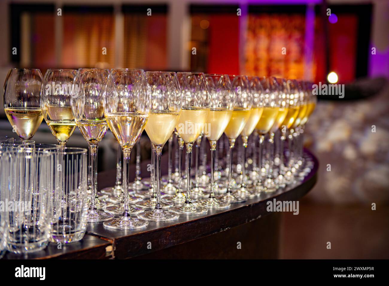 Rows and rows of champagne glasses in a circle Stock Photo - Alamy