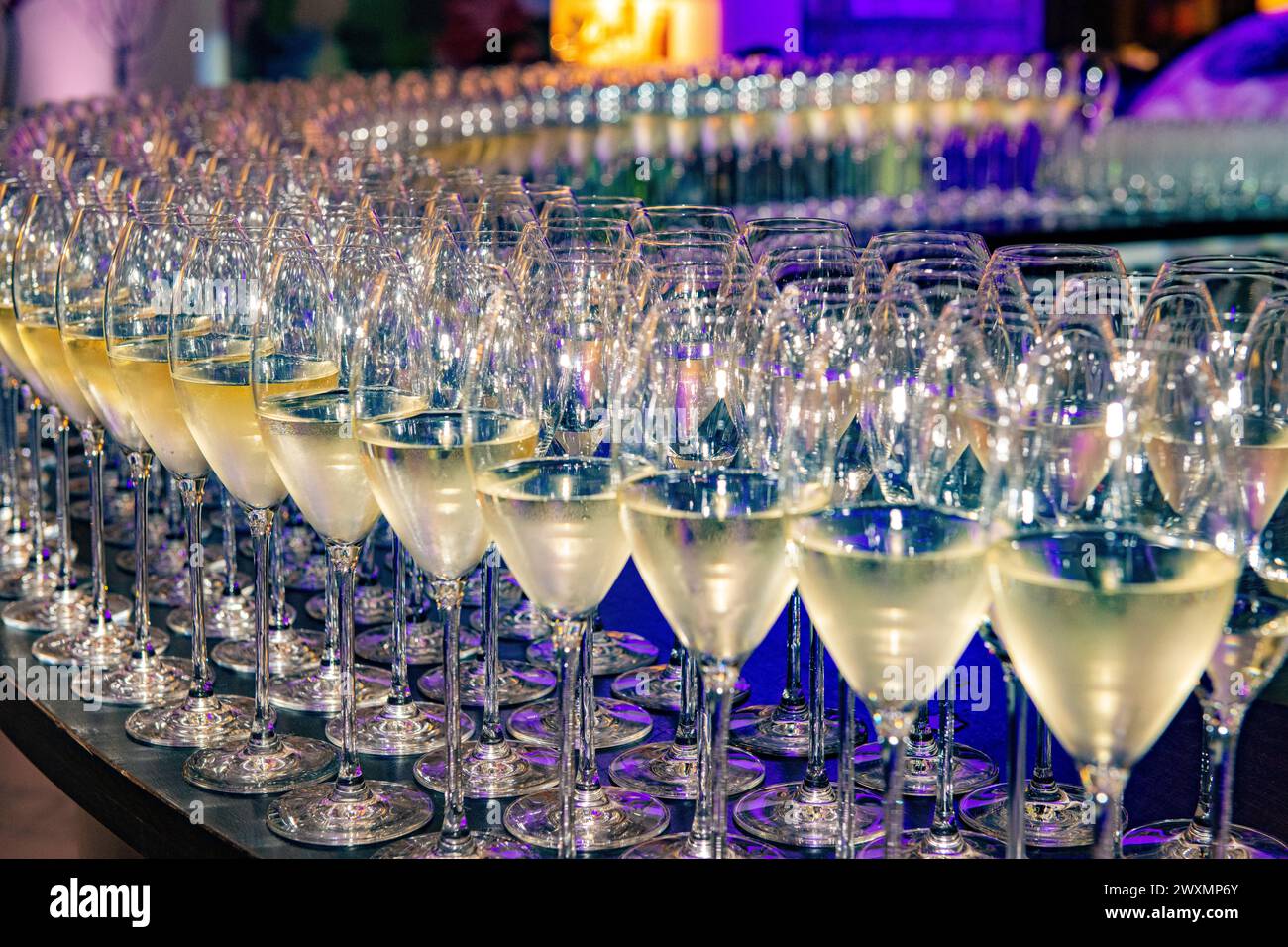 Rows and rows of champagne glasses in a circle Stock Photo - Alamy