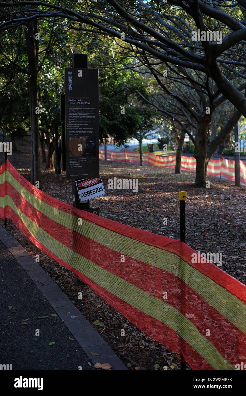 Hazard fencing around garden beds and trees in Cook & Philip park. The ...