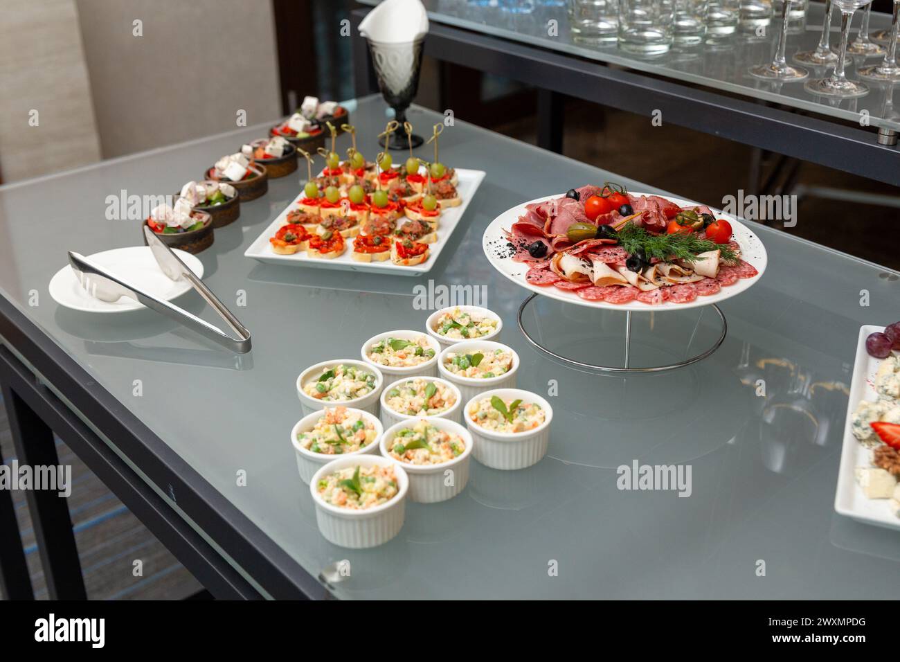 Buffet table with cold appetizers and salads. Buffet food, catering ...
