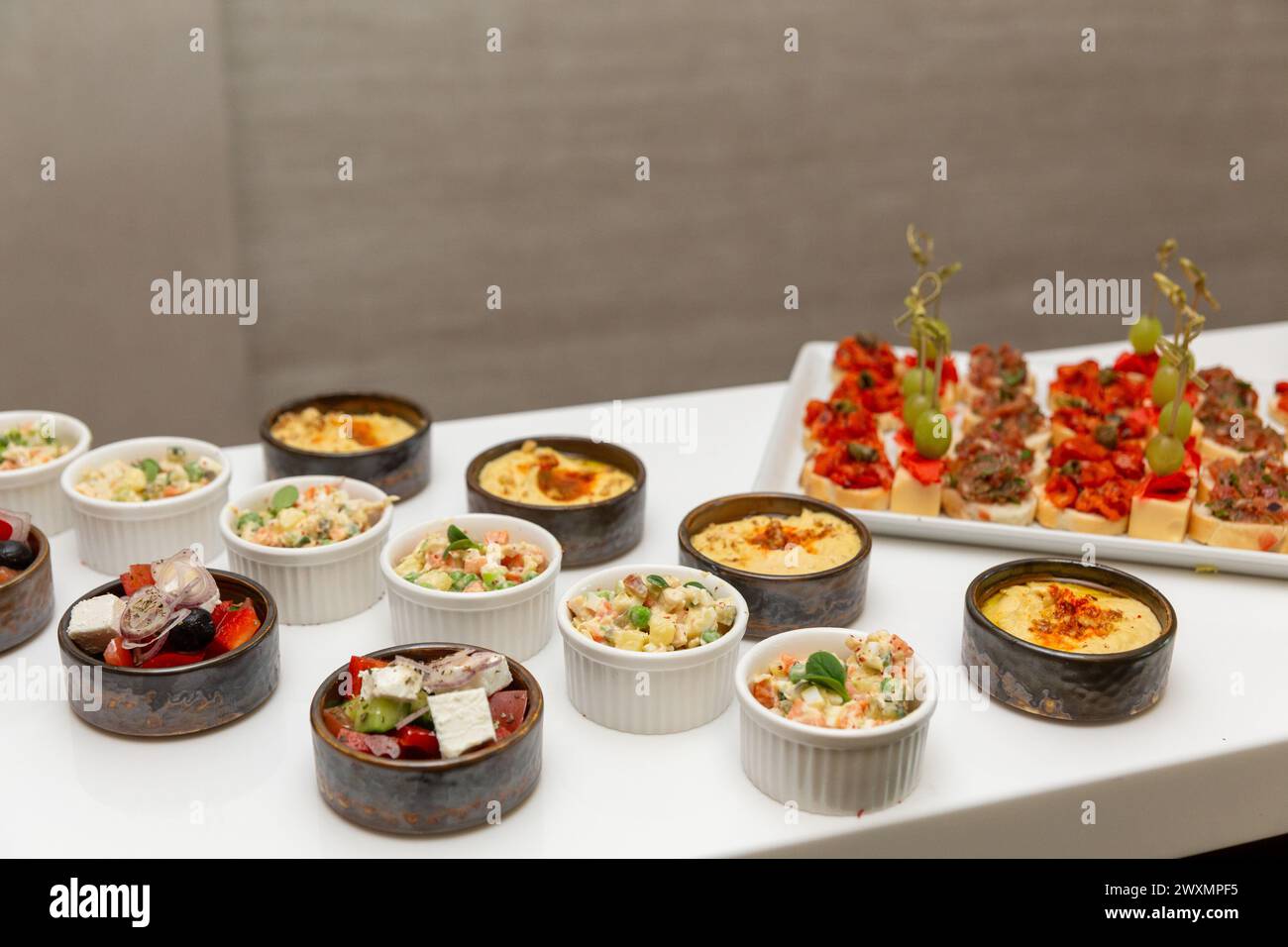 Buffet table with cold appetizers and salads. Buffet food, catering ...