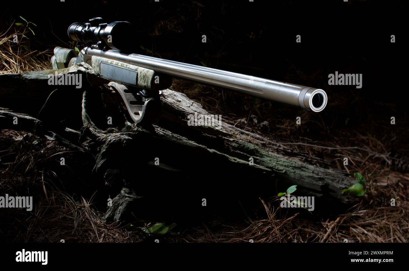 Room for text below a fifty caliber inline muzzeloading rifle and optic ...