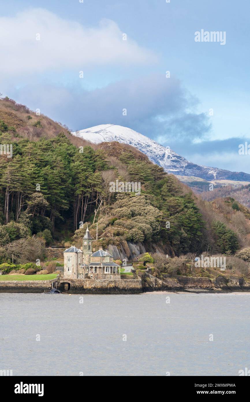 Snow capped Snowdonia above Coes Faen Hall also known as The Clock ...