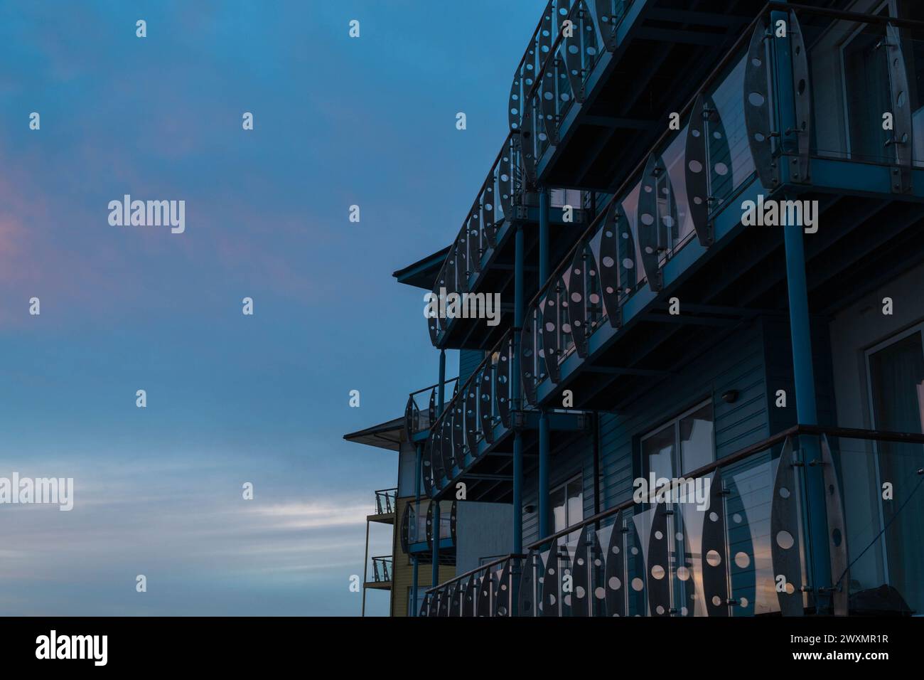 Night sky colours of the setting sun reflected in the architecture ...