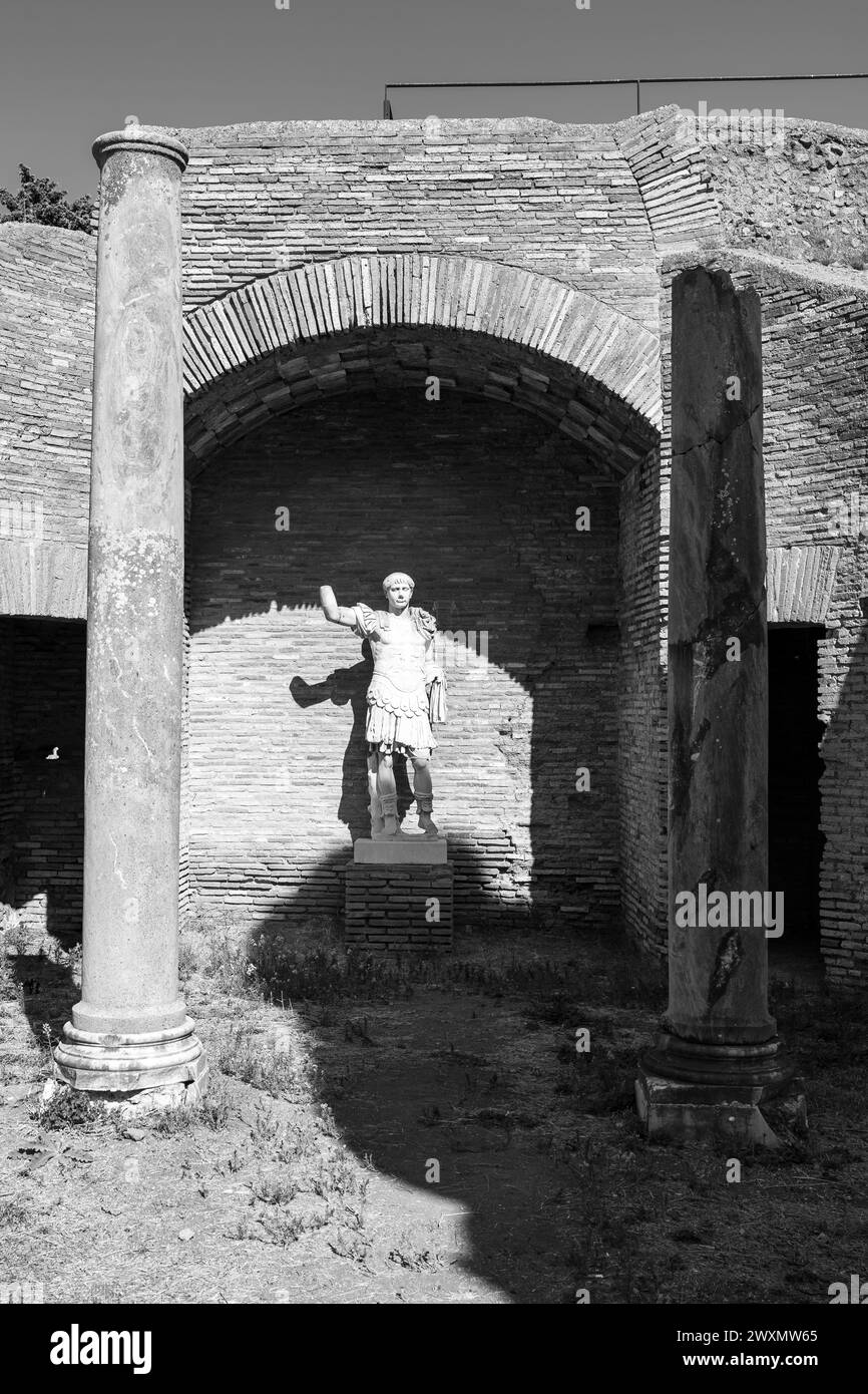 Black and white photo of broken statue of roman emperor inside the ...