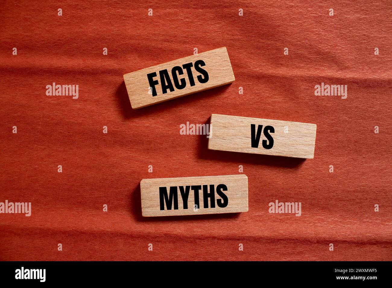 Facts vs myths words written on wooden blocks with brown background ... Facts vs myths words written on wooden blocks with brown background ...