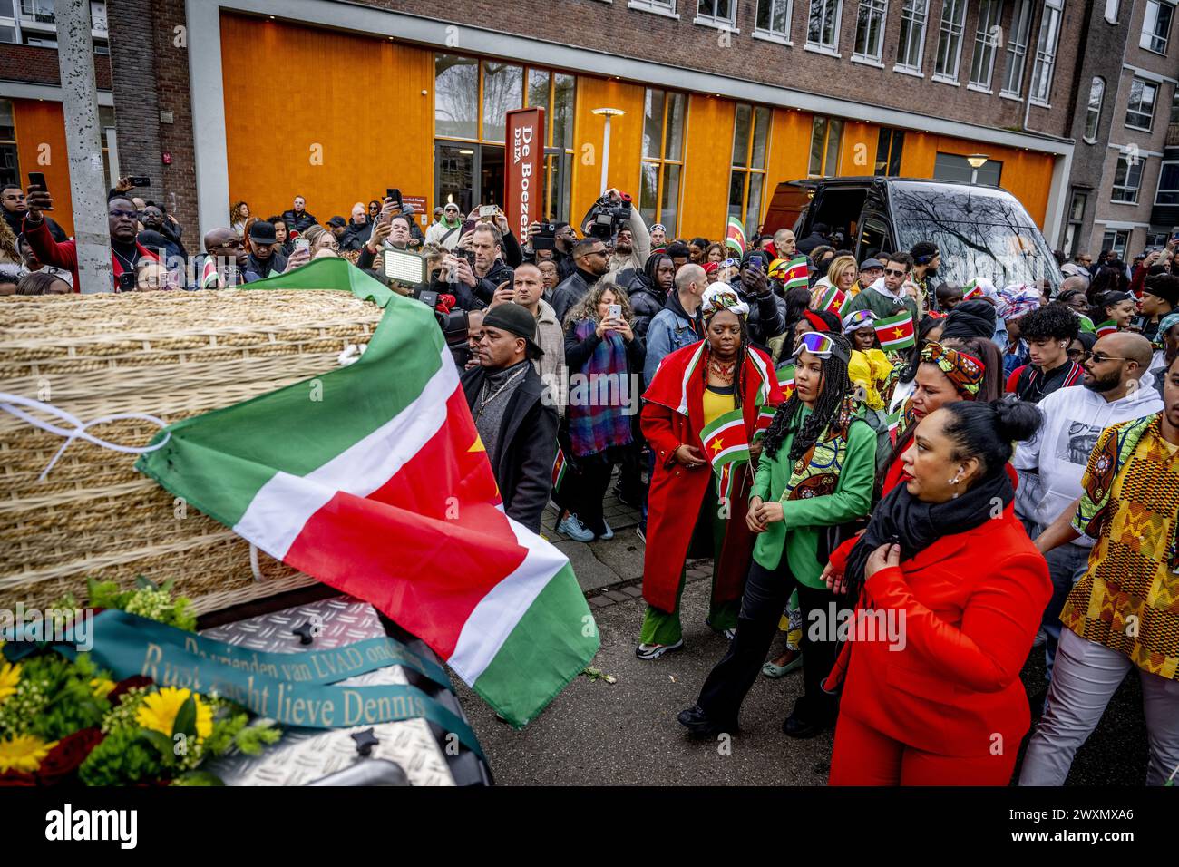 ROTTERDAM - The body of rapper Def Rhymz is driven around during a ...