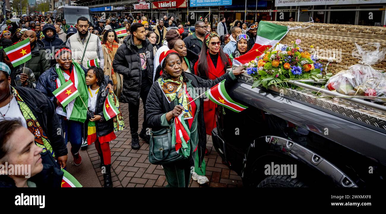 ROTTERDAM - The body of rapper Def Rhymz is driven around during a ...